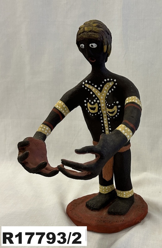 Three Indigenous clay figures with spear, fish and bowl.; Osca Anderson ...