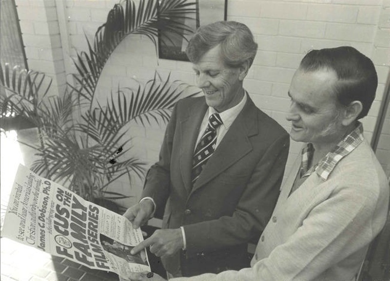 Photograph of Rev. Rex Smith, promoting a family film series to be held ...