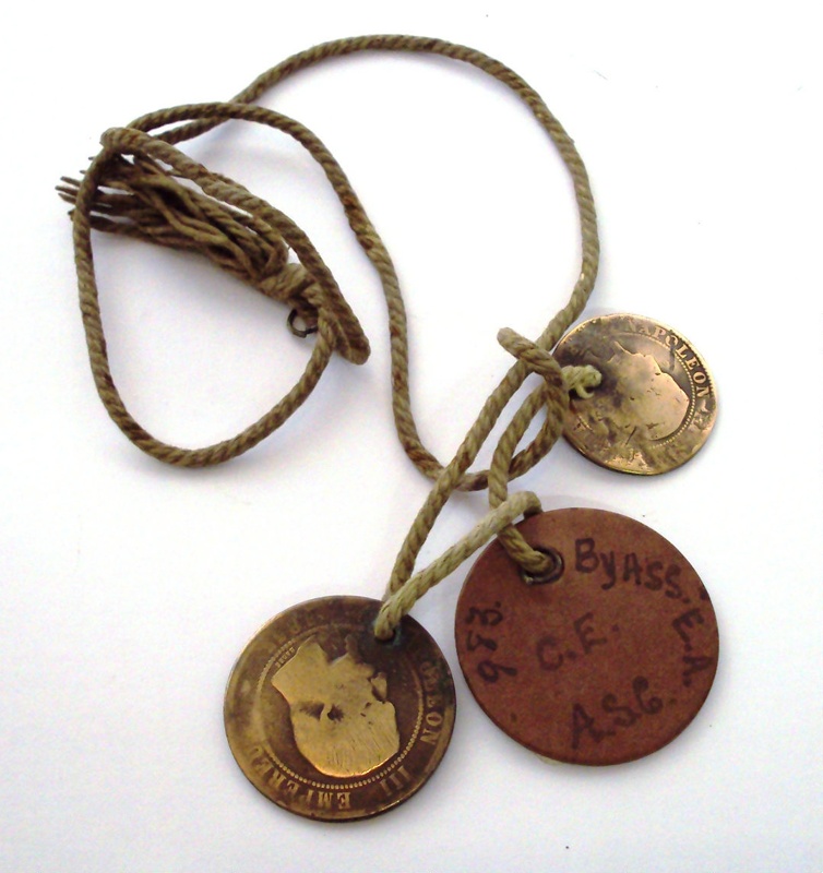 Identity disk & 'lucky' coins; disk - 1914(c); WSRM122 | eHive