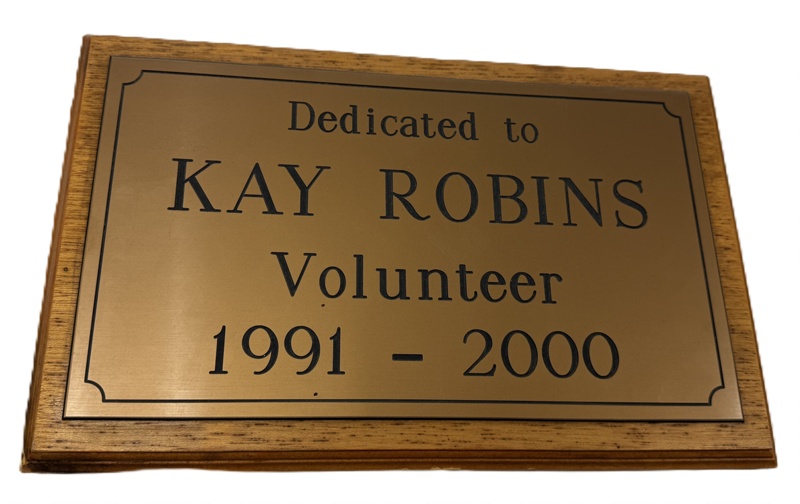 Plaque: Dedicated to Kay Robins Volunteer 1991-2000; Ca 2000; AR#18935 ...