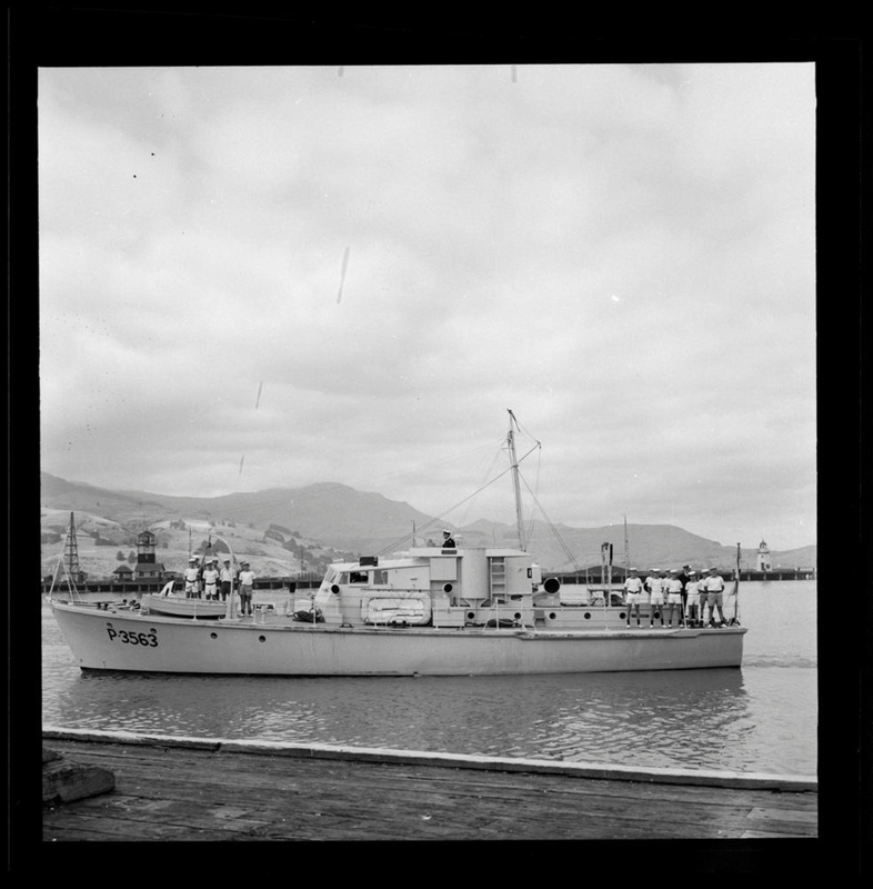 15 unidentified young men standing on deck of HMNZS 'Kuparu', P3563, in ...