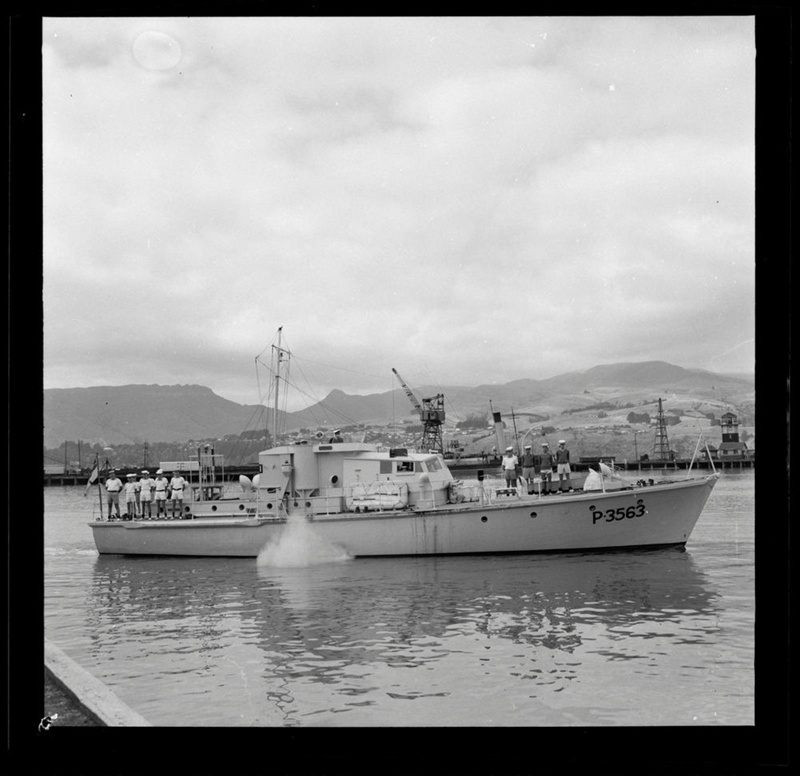 15 unidentified young men standing on deck of HMNZS 'Kuparu', P3563, in ...