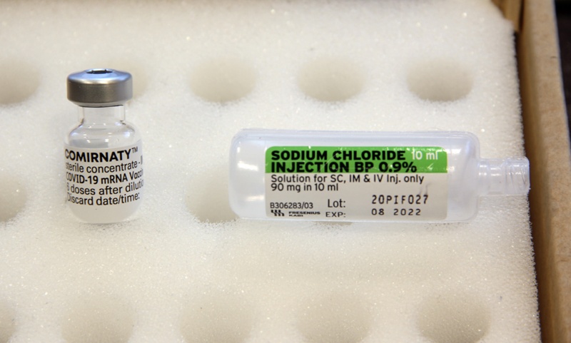 COMIRNATY™ (Pfizer) COVID-19 mRNA vaccine vial and saline ampoule ...