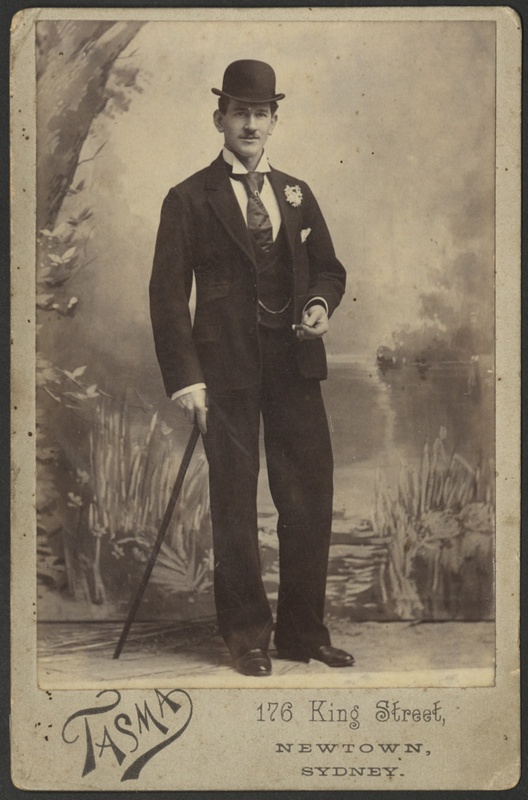 Studio photo of a gentleman presented in Charlie Chapman type attire ...