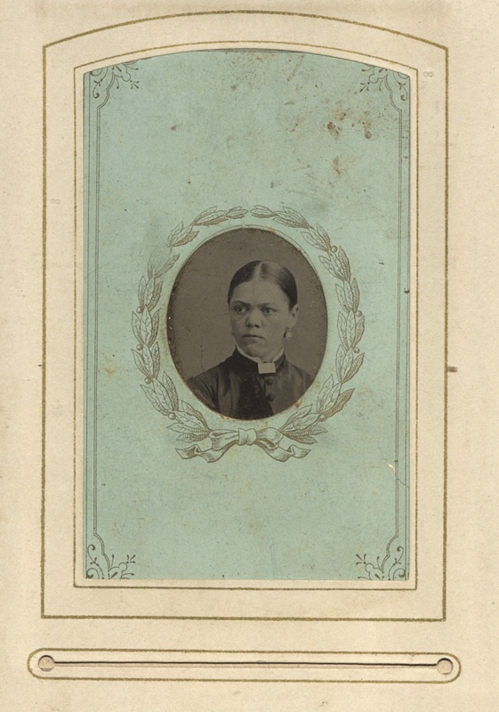 Studio head and shoulder photo of a lady in formal attire.; J.Hubert ...