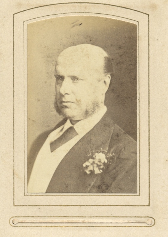 Studio head and shoulder photo of a gentleman in formal attire.; J ...
