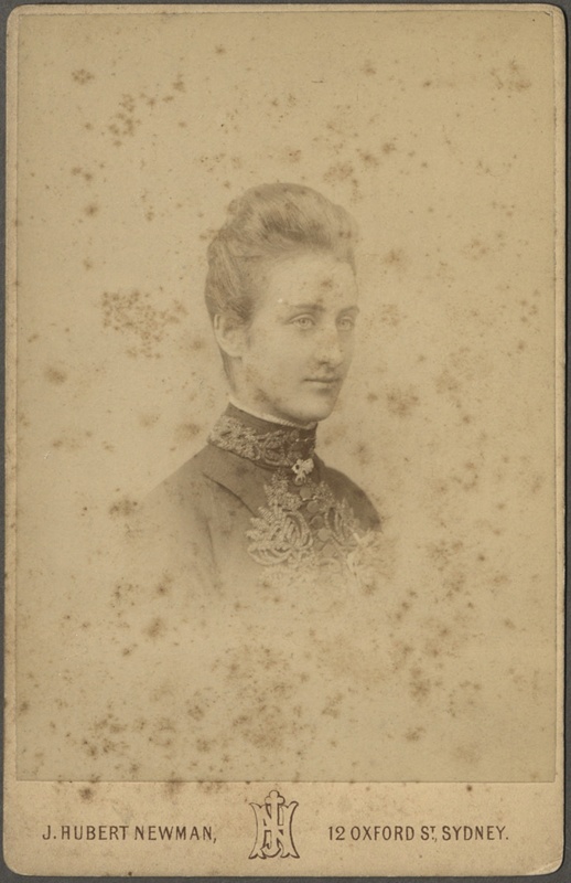 Studio head and shoulder photo of a formally attired young lady.; J ...