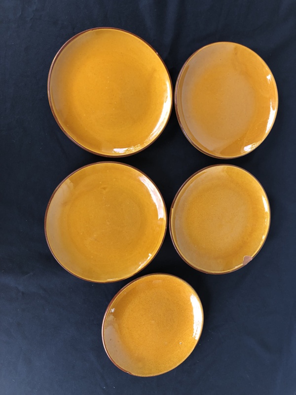 Dinner plates, set of five round orange glazed ceramic; 2023.160:1-5 ...