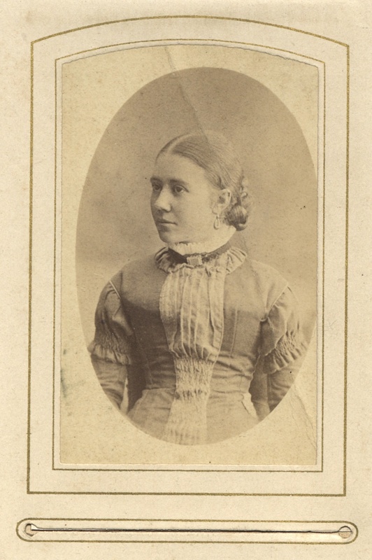 Studio head and shoulder photo of a lady in formal attire.; J.Hubert ...