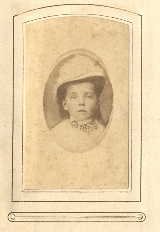 Studio head and shoulder photo of a very young girl.; J.Hubert Newman ...