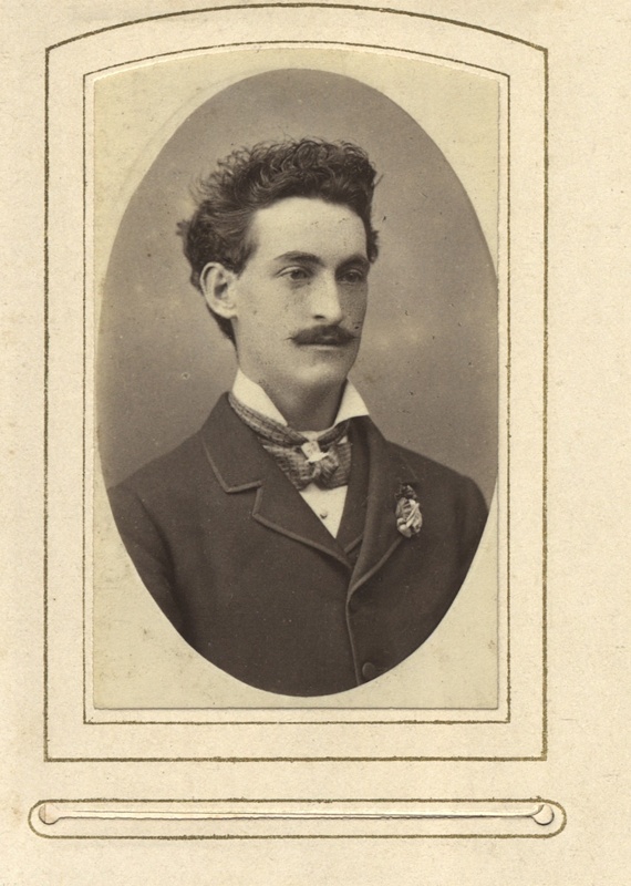 Studio head and shoulder photo of a mustachioed young man.; J.Hubert ...