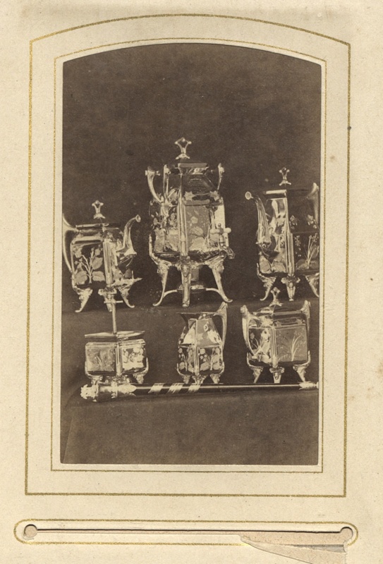 Studio photo of a 7 piece silverware teapot set.; J.Hubert Newman ...