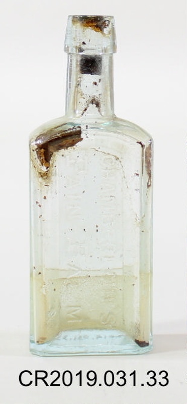 Clear glass rectangular bottle; Chamberlain Medicine Company, USA ...