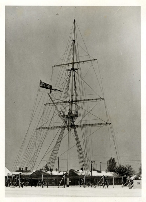 Photograph of the mast at HMS Ganges, winter 1954.; photographer ...