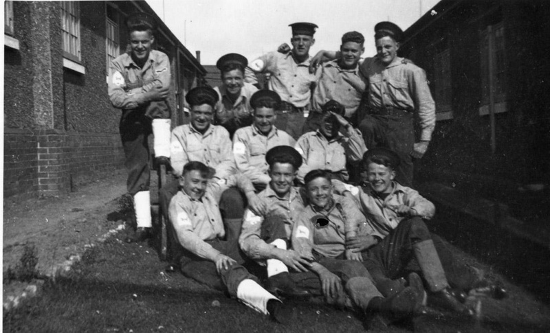 Photograph of 12 boys in garden outside 18 Mess, Grenville Division ...