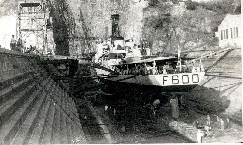 Photograph of HMS St. Brides Bay in dry dock; photographer; SHHMG:A4599 ...