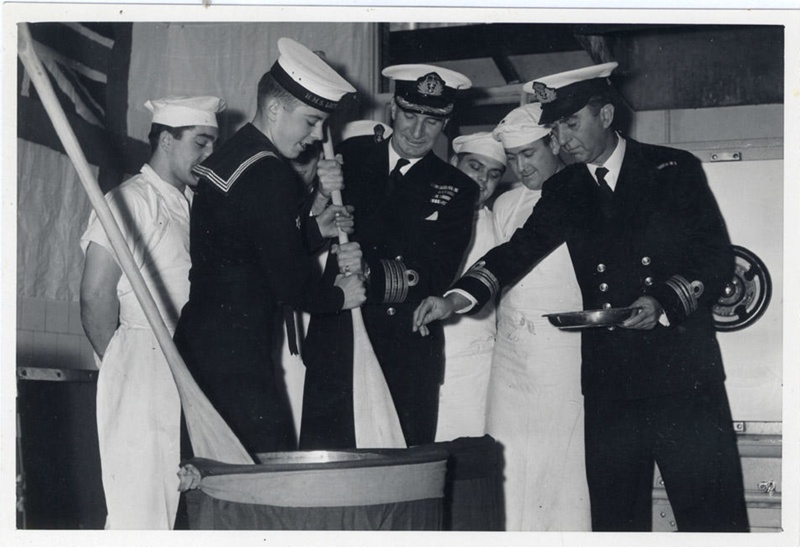 A photograph of Captain Pond stirring the Christmas pudding on HMS ...