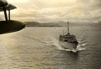 Photograph of HMS Philante at sea with a submarine in the background ...