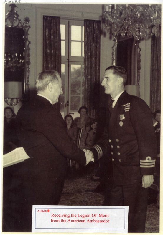 A photograph of Commander Pond receiving the Legion Of Merit from the ...