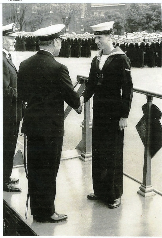 Photograph of Captain Button shaking hands with Slinger Woods with ...