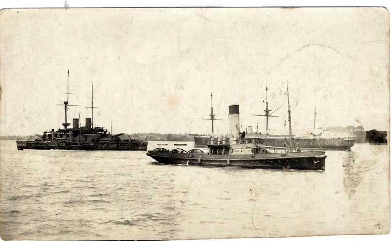 Photograph of HMS Camperdown, HMS Ganges 11 and a tug.; SHHMG:A197 | eHive