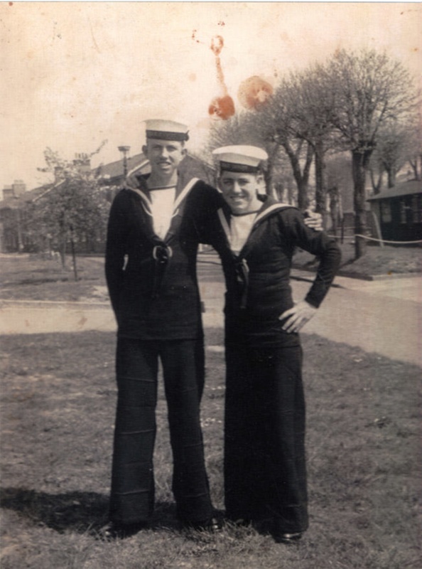 A photograph of 331 Class Visual Signalers R.A. Codling (left) and E.T ...