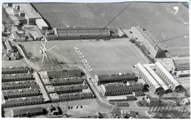 Photograph of aerial view of parade ground with boys formed up to spell ...