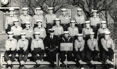 Photograph of 20 boys, 1 Instructor and 1 Lieutenant Commander making ...