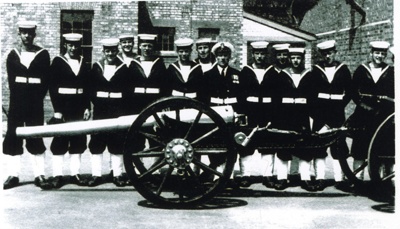 A photograph of a field gun crew from classes 148 and 63 1950.; SHHMG ...