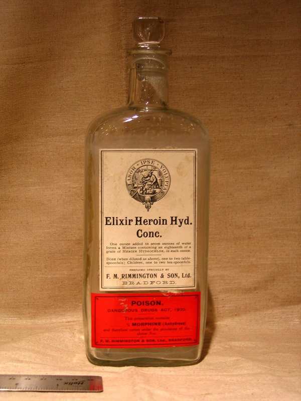 Clear Glass Bottle Matching Closure and Paper Label: Elixir of Heroin ...