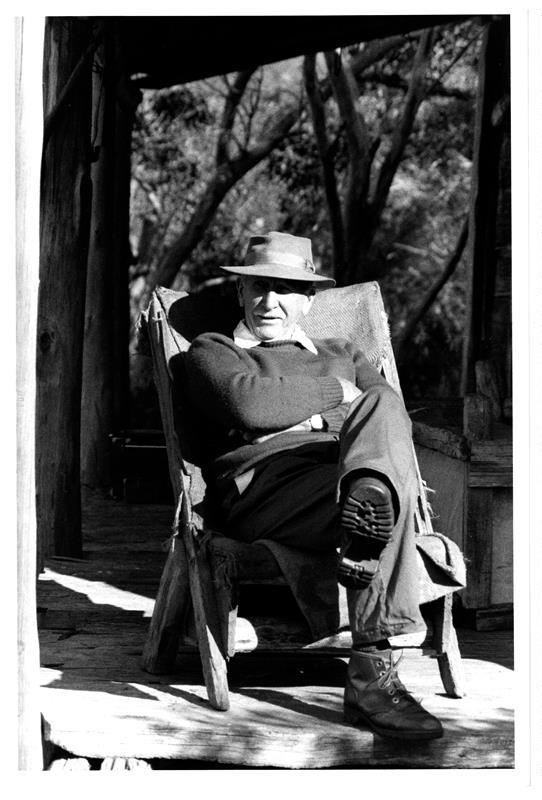 Harry Findlay and the chair he made in the 1940's. At Wheeless hut ...
