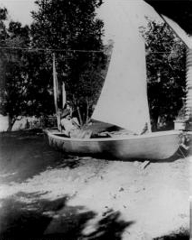 Photo - Munro Hull seated in his boat Munna Point, c.1920; c. 1920; P ...