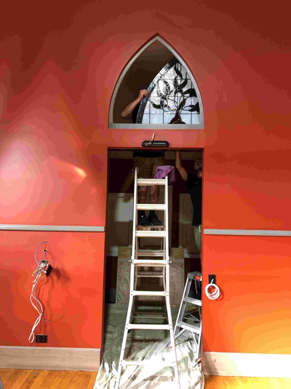 Installation of stained glass arched window; Eumundi Museum; 06/04/2022 ...