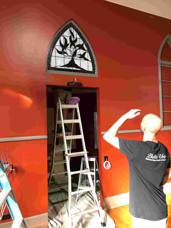 Installation of stained glass arched window; Eumundi Museum; 06/04/2022 ...