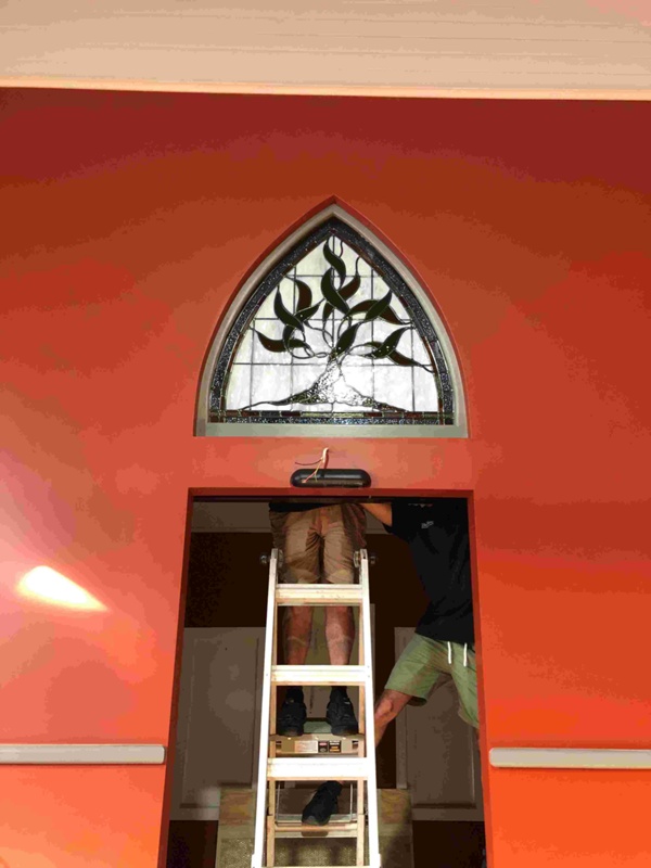 Installation of stained glass arched window; Eumundi Museum; 06/04/2022 ...