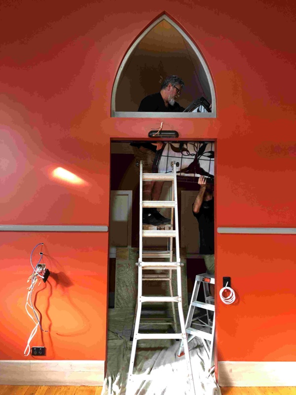Installation of stained glass arched window; Eumundi Museum; 06/04/2022 ...