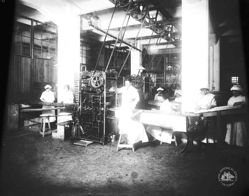 Adding the chocolate coating, MacRobertson Factory, Fitzroy; Allan ...