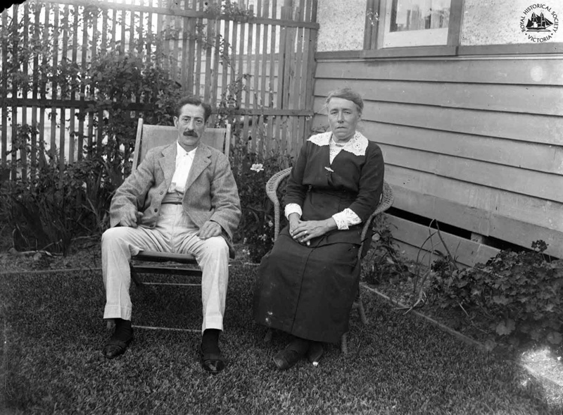 Man and woman seated in garden, c. 1915; Merlo, Paul William, 1877-1954 ...