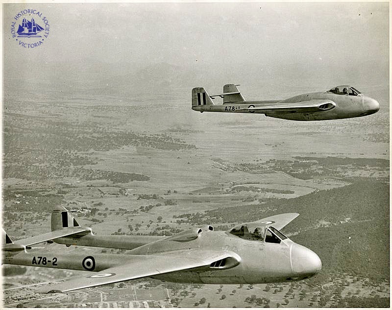 Two RAAF De Havilland Vampire fighters in flight near Canberra; c. 1950 ...