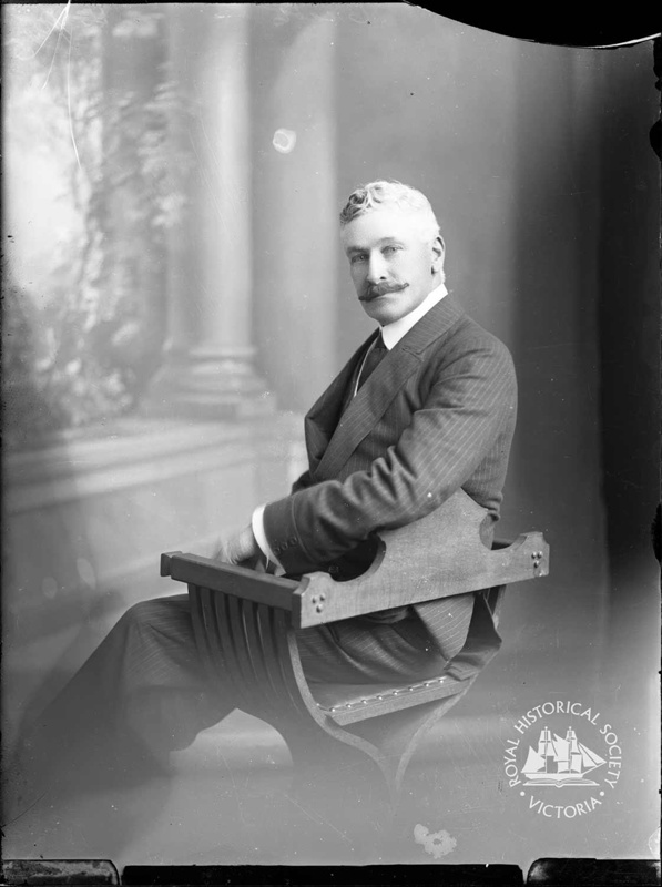 Macpherson Robertson seated in a chair; GN-MAC-157 | eHive