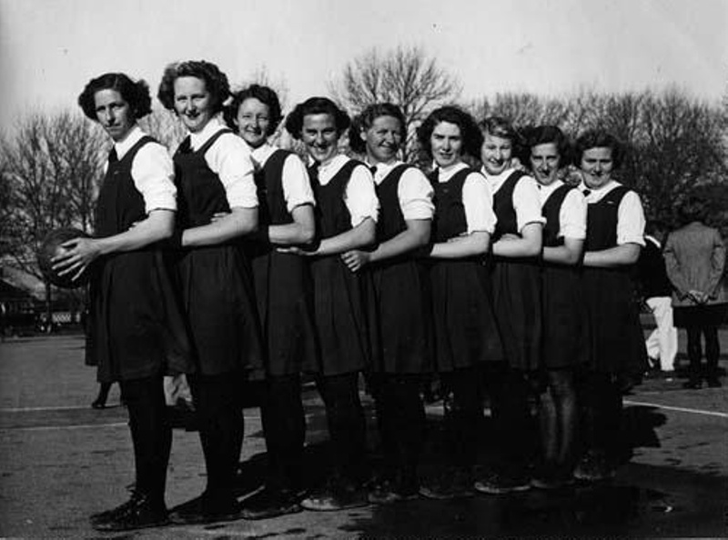 early netball in line big to small 9 girls , netballer in jacket back ...
