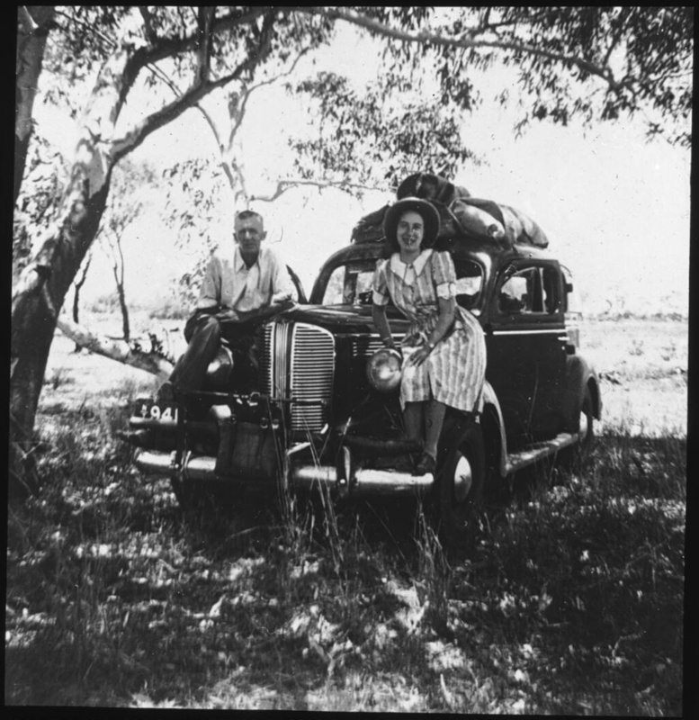 Mr. Partridge and Mrs. Grant sitting on the bonnet of the car : lantern ...