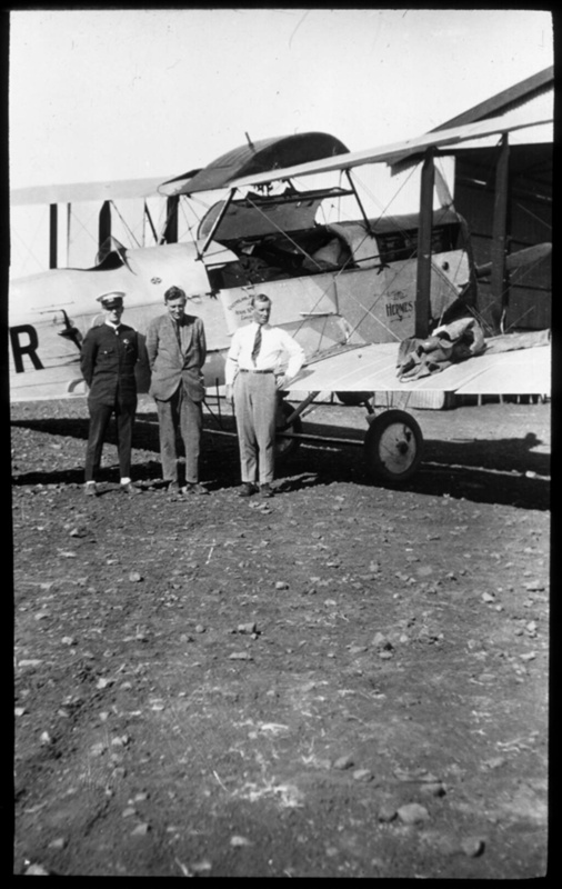 Qantas pilot, Captain Evans with Dr. George Simpson (centre) and an ...