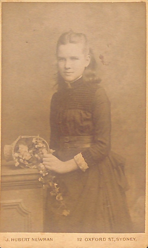 Studio portrait of a young girl in Victorian dress; J. Hubert Newman ...