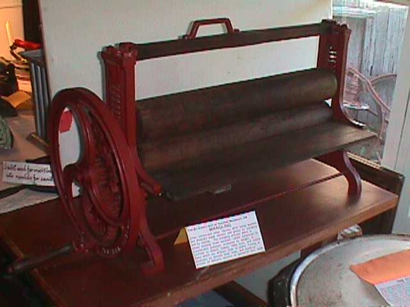 Mangle, bench mounted, metal frame, wooden rollers, folding handle; 225 ...