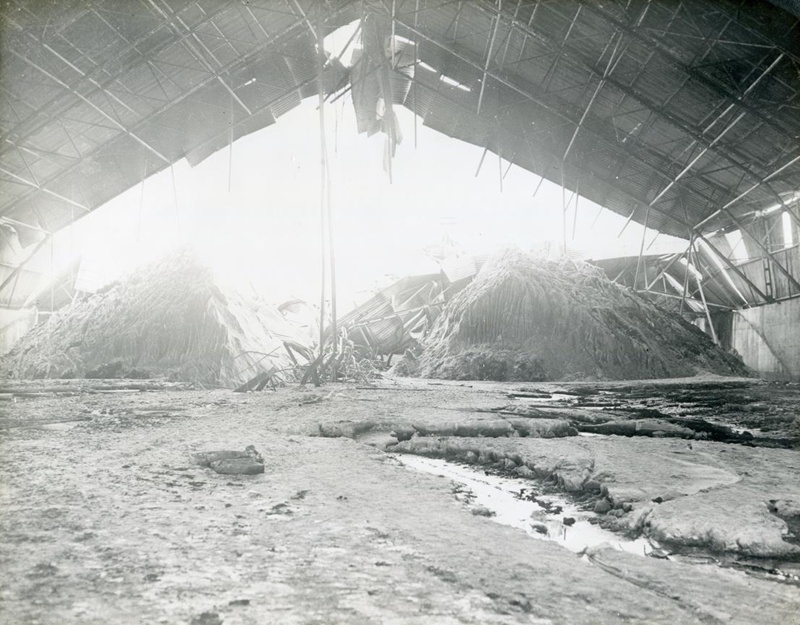 Bulk sugar terminal, interior north end of shed. Molten sugar and water ...