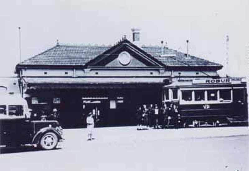 Electric tram and a bus outside Sandringham station; 192-; P1061 | eHive