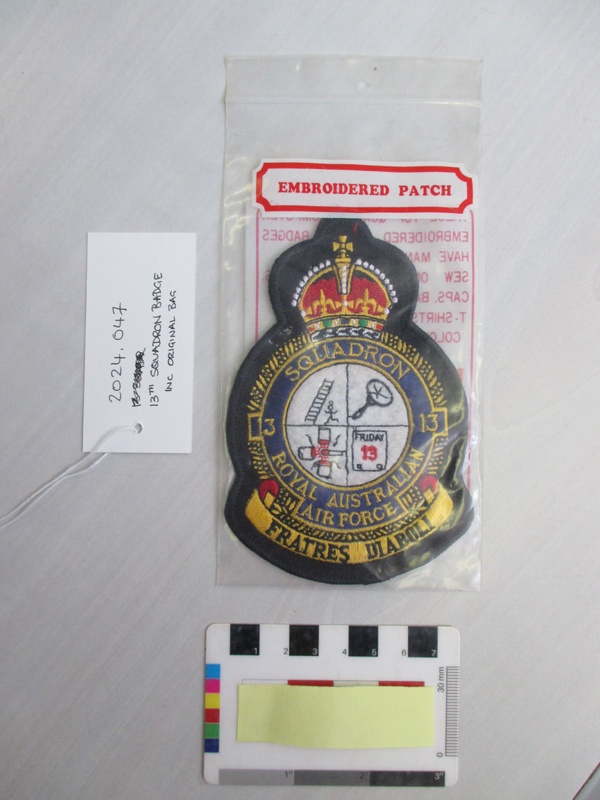 RAAF 13th Squadron cloth badge in original packaging; Lukus Productions ...